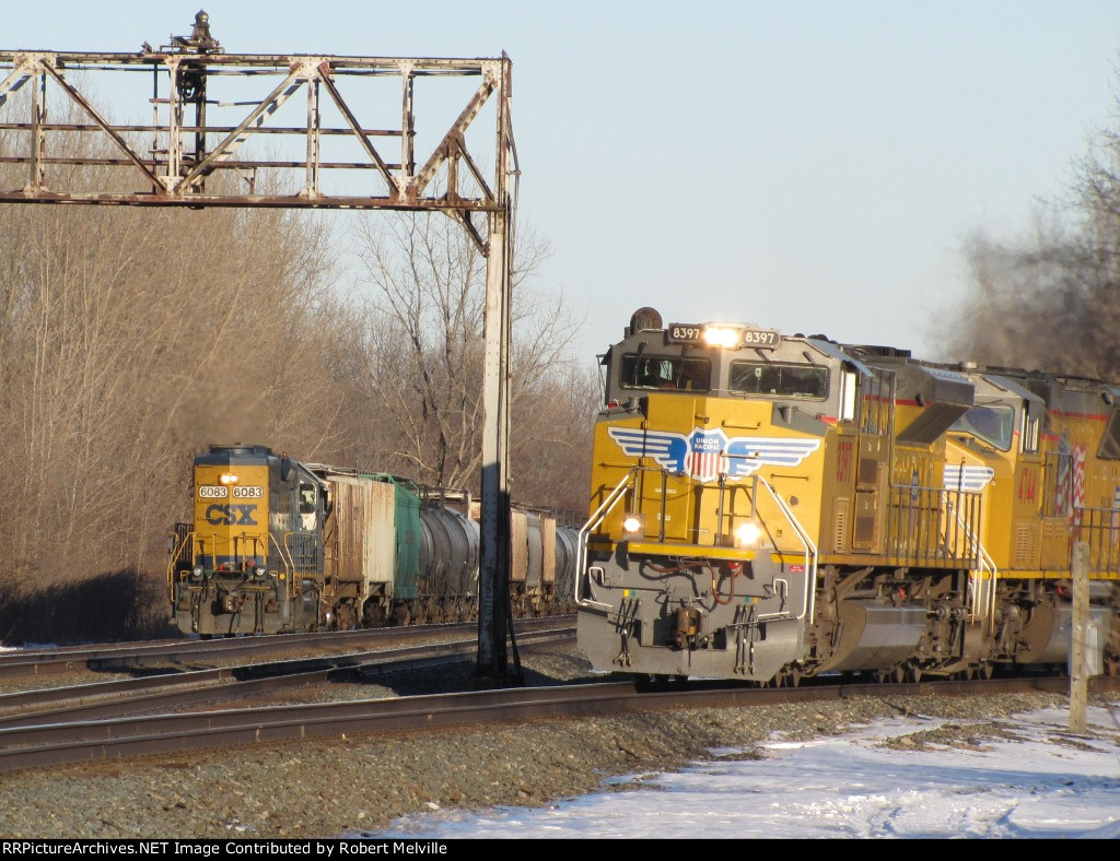UP 8397 exiting the Westshore - local B791 with CSXT 6083 waits its turn to head back east